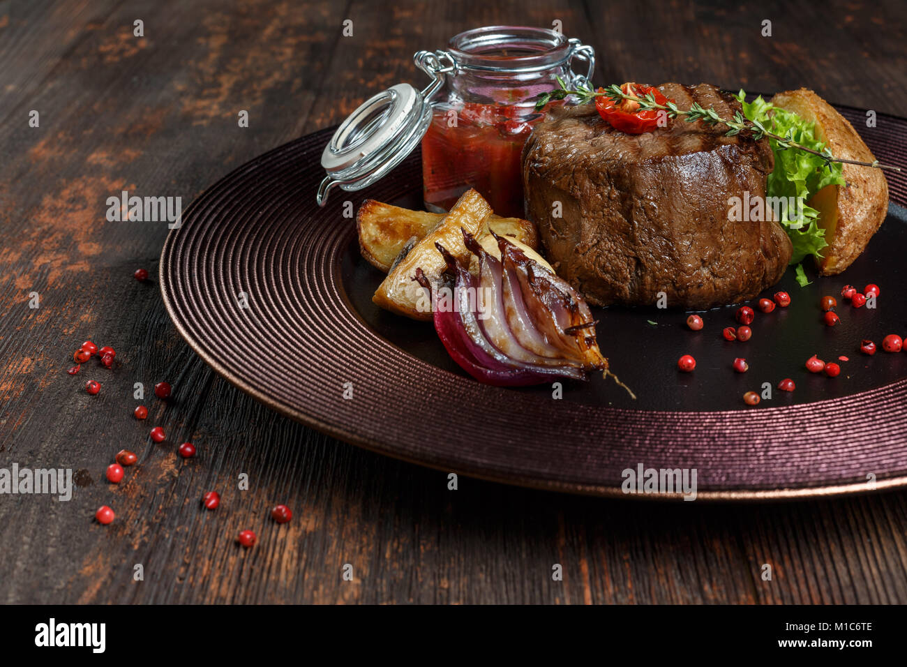 steak medallion. restaurant food. wood background Stock Photo - Alamy