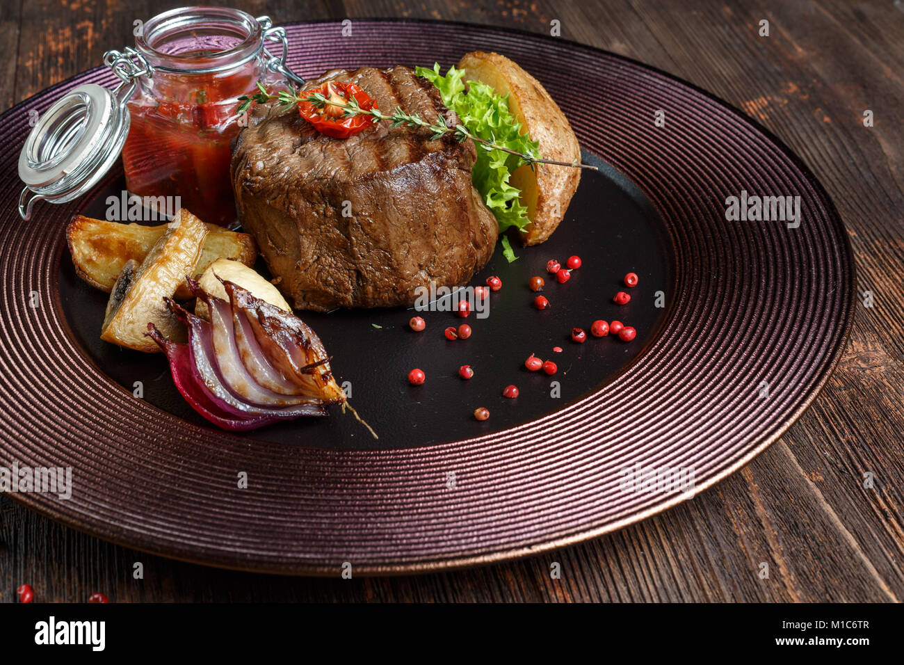 steak medallion. restaurant food. wood background Stock Photo - Alamy