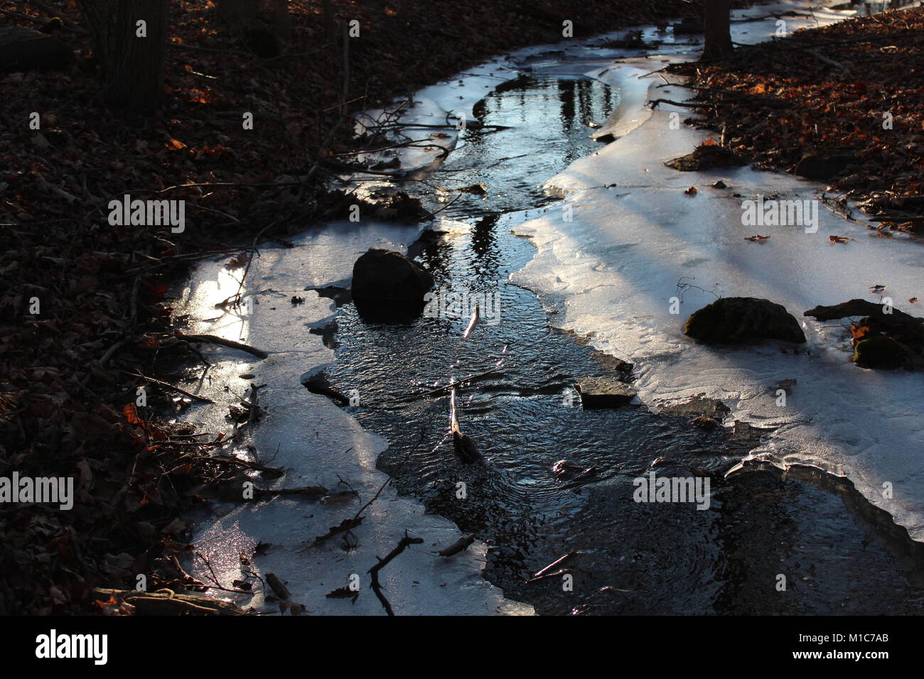 Light Rays Through An Icy River Stock Photo - Alamy