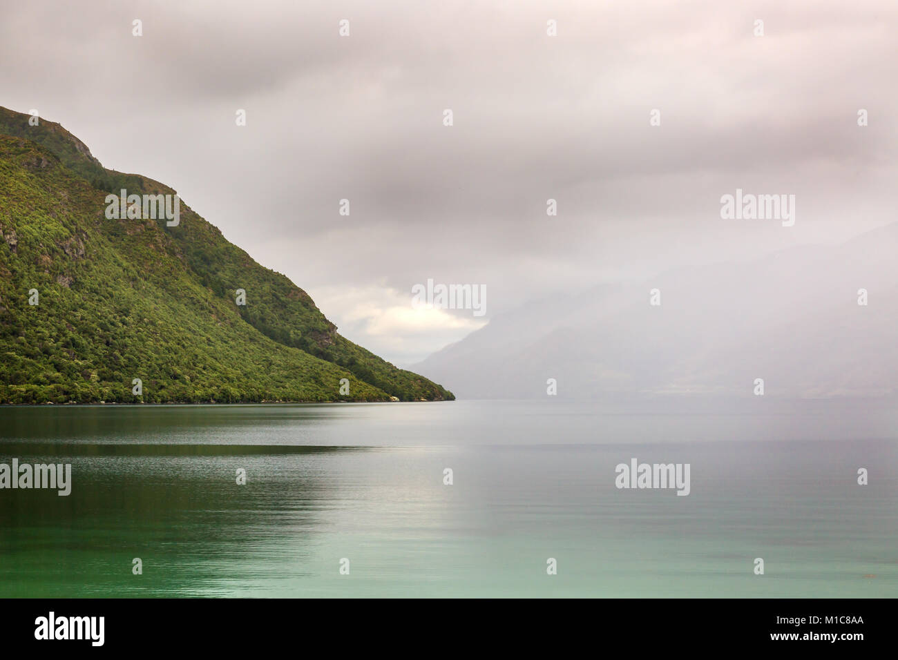 Gloomy view at lake Wakatipu, near Kingston, Queenstown, New Zealand ...