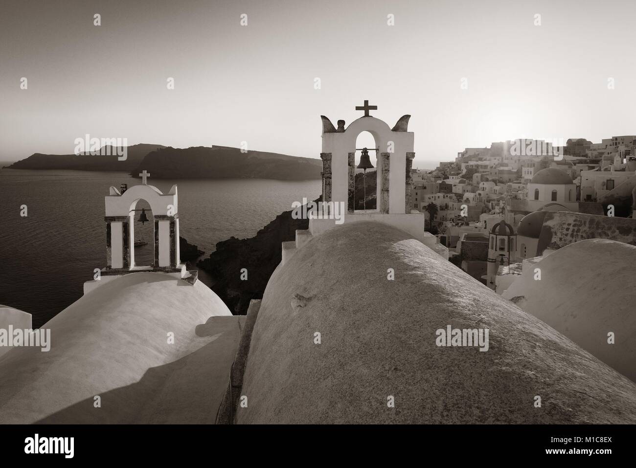 Santorini skyline with buildings in Greece Stock Photo - Alamy