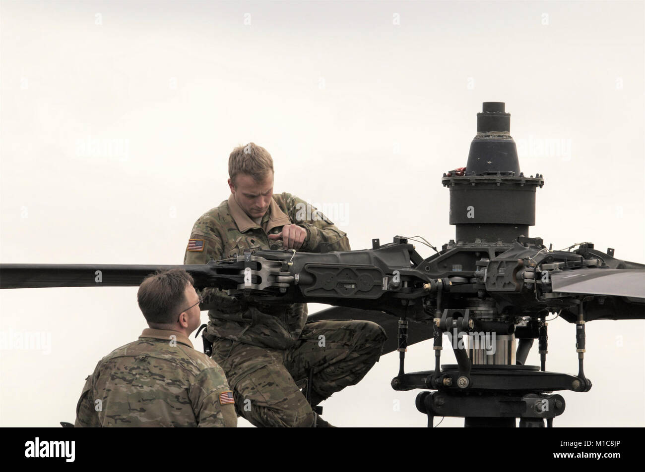 U.S. Soldiers with the 1st Battalion, 3rd Aviation Regiment (Attack ...