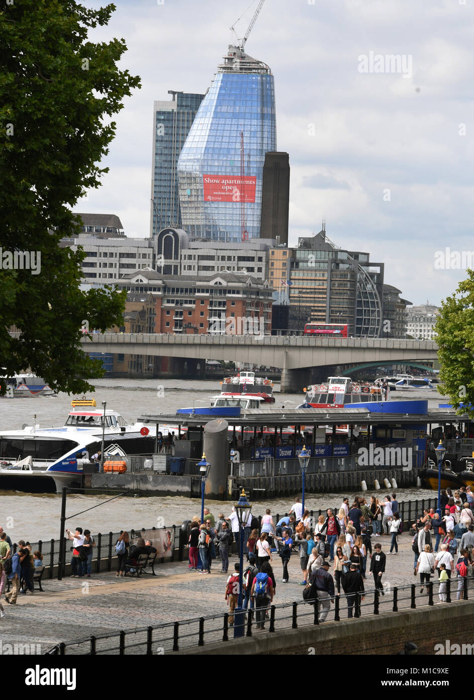 Tourists along the Tower Pier in London, England, 20 August 2017. Photo ...