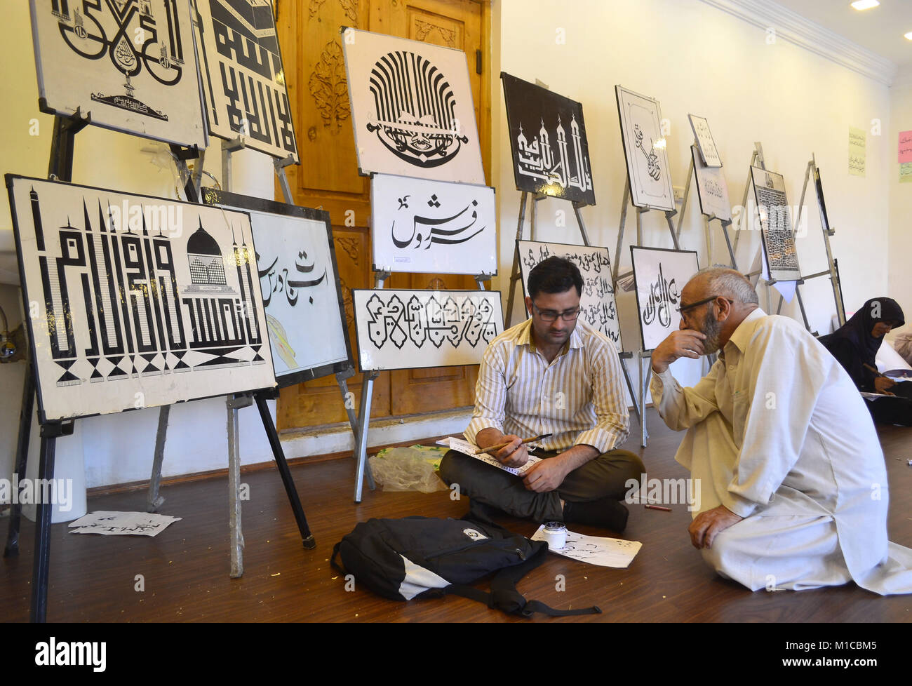 Indian calligrapher hi-res stock photography and images - Alamy
