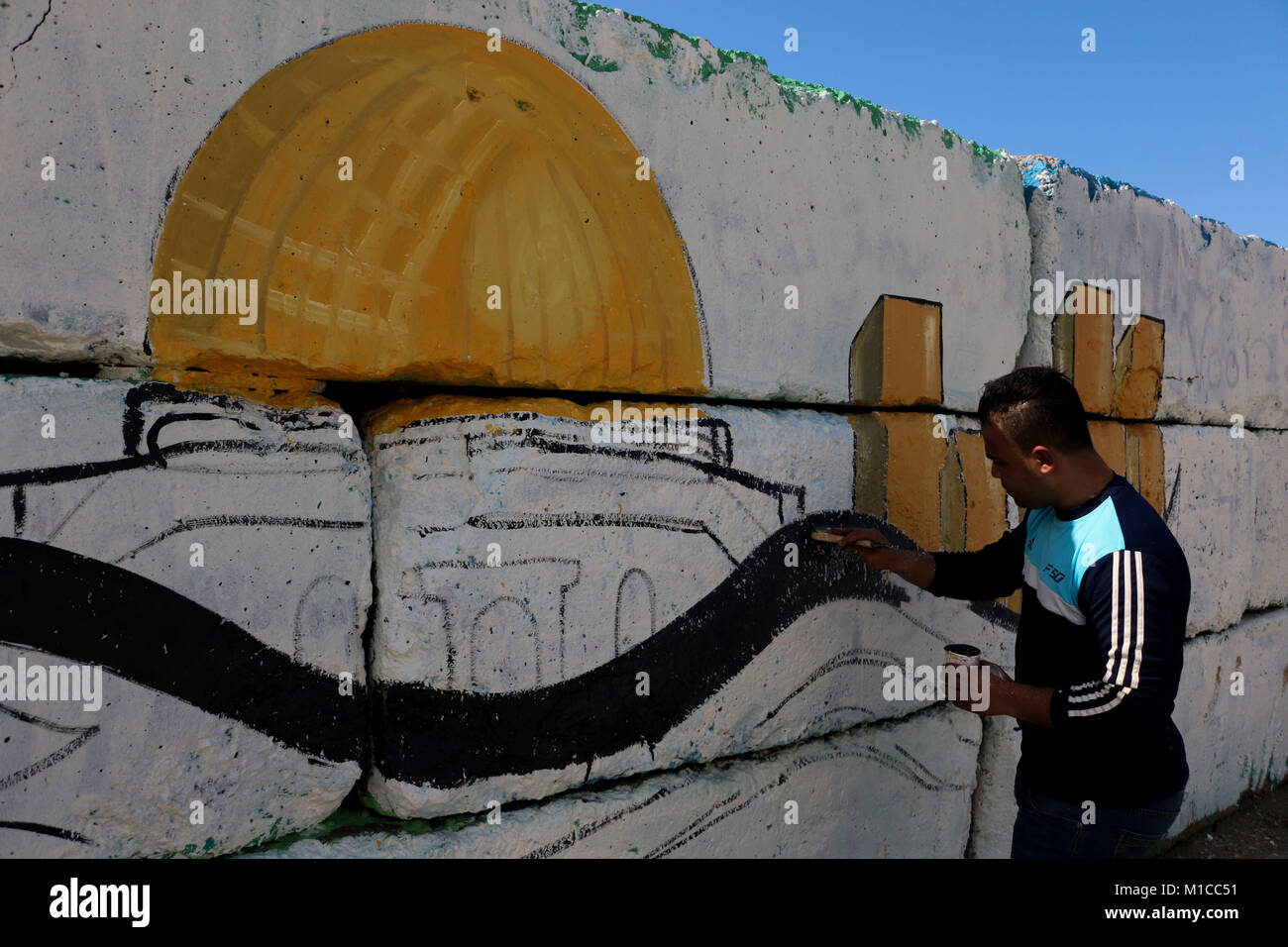 Jerusalem. 29th Jan, 2018.Artists Bakr Omar and Rania Murad paint ...