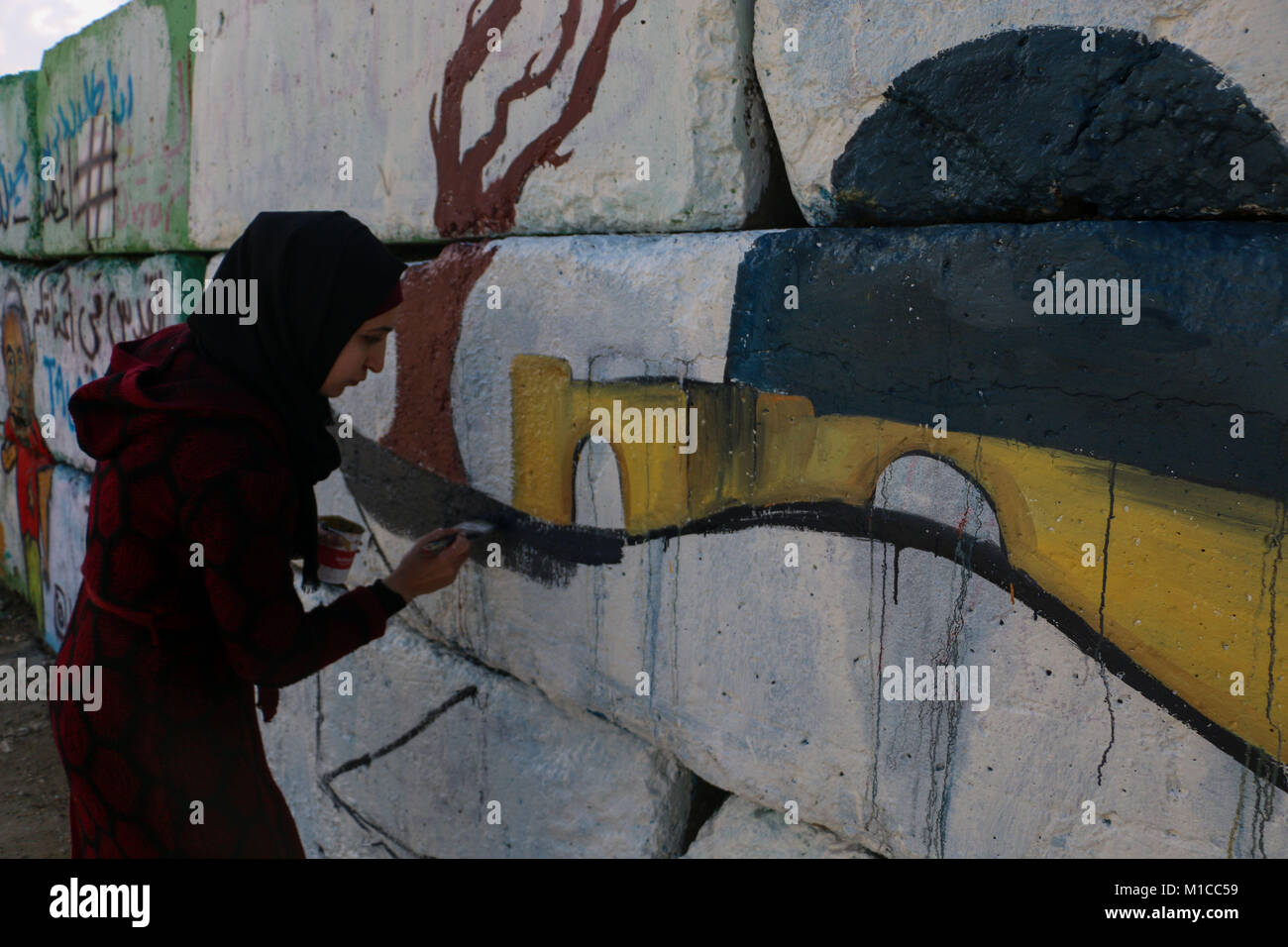 Jerusalem. 29th Jan, 2018.Artists Bakr Omar and Rania Murad paint ...