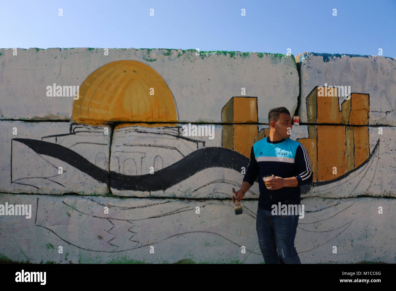 Jerusalem. 29th Jan, 2018.Artists Bakr Omar and Rania Murad paint ...