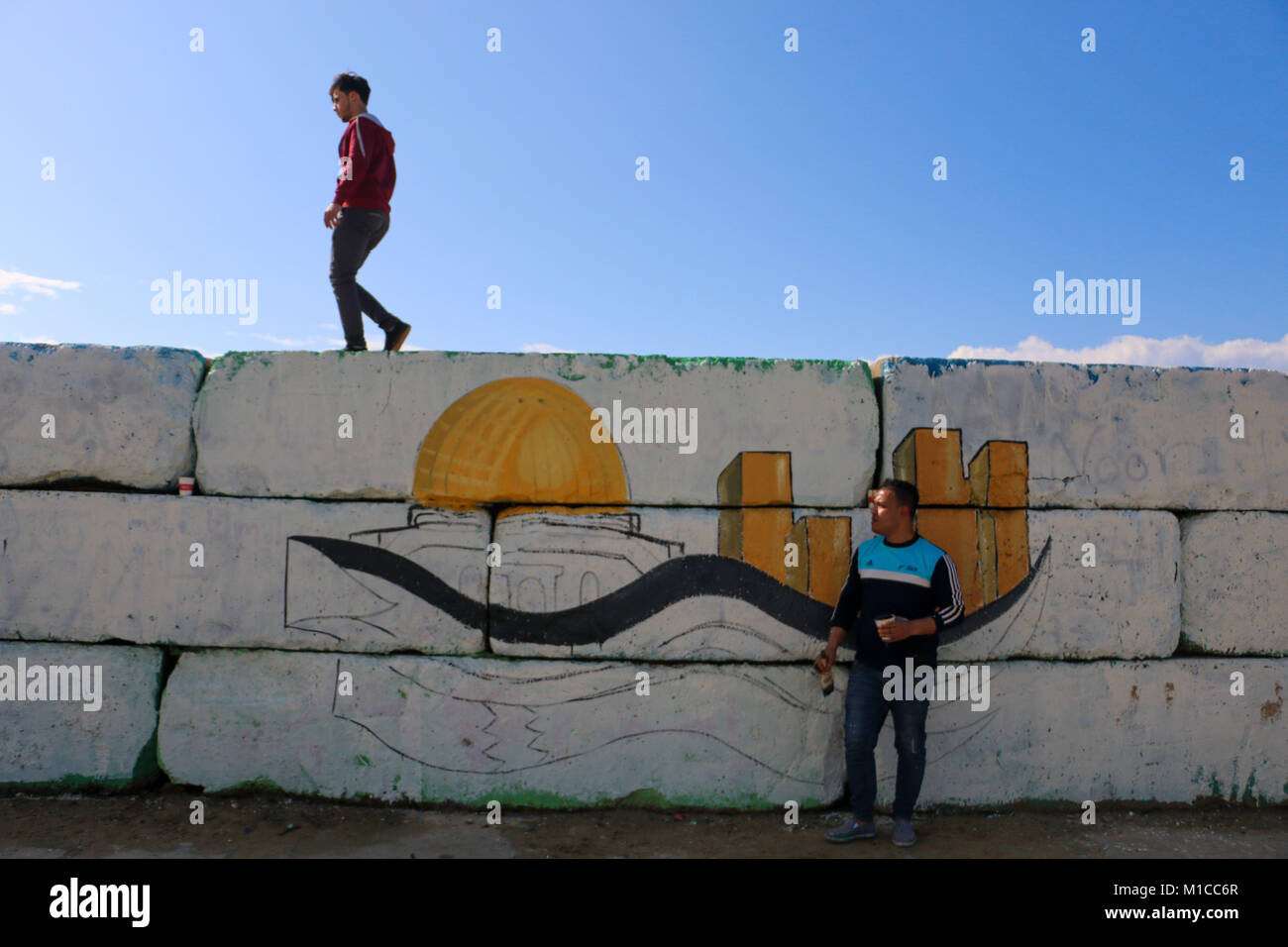Jerusalem. 29th Jan, 2018.Artists Bakr Omar and Rania Murad paint ...