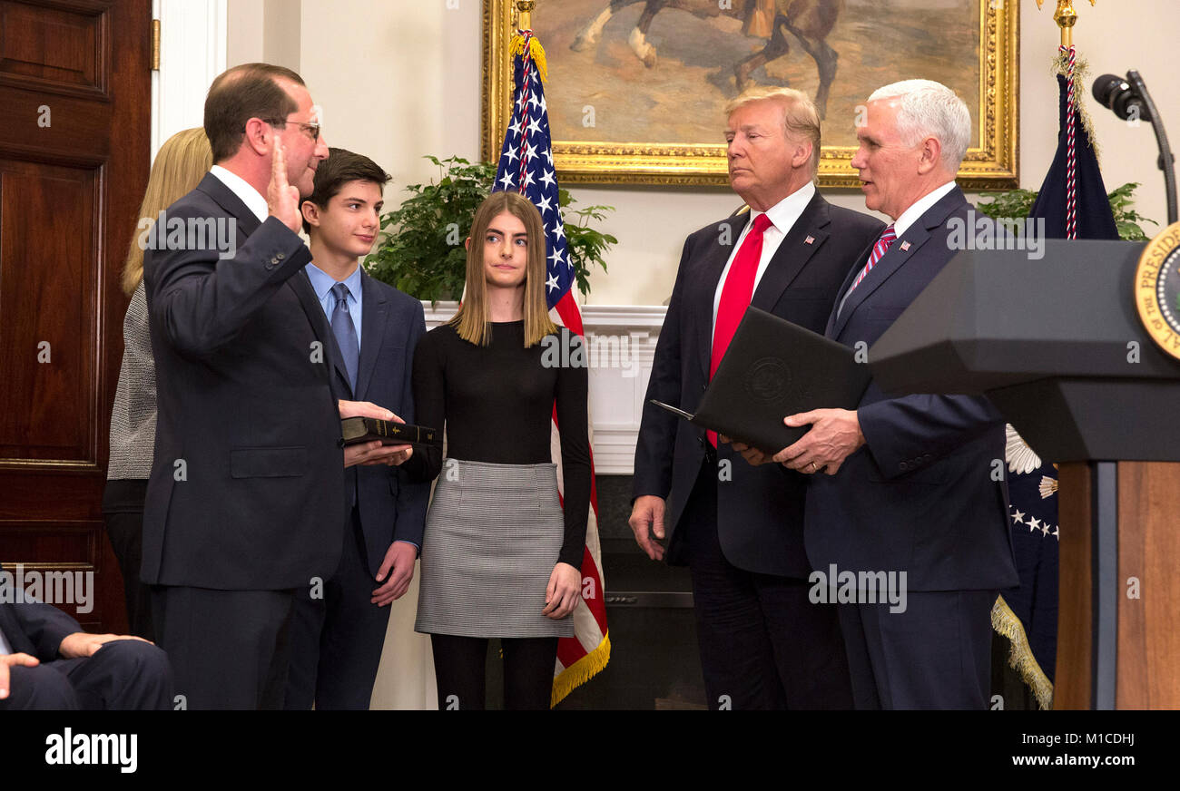 United States President Donald J. Trump looks on as Alex Azar is sworn ...