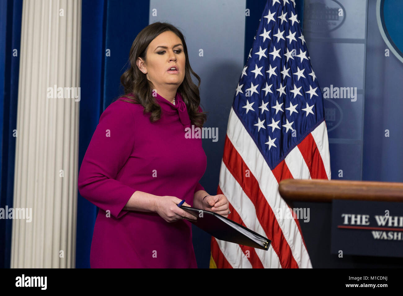 White House Press Secretary Sarah Huckabee Sanders takes the podium ...