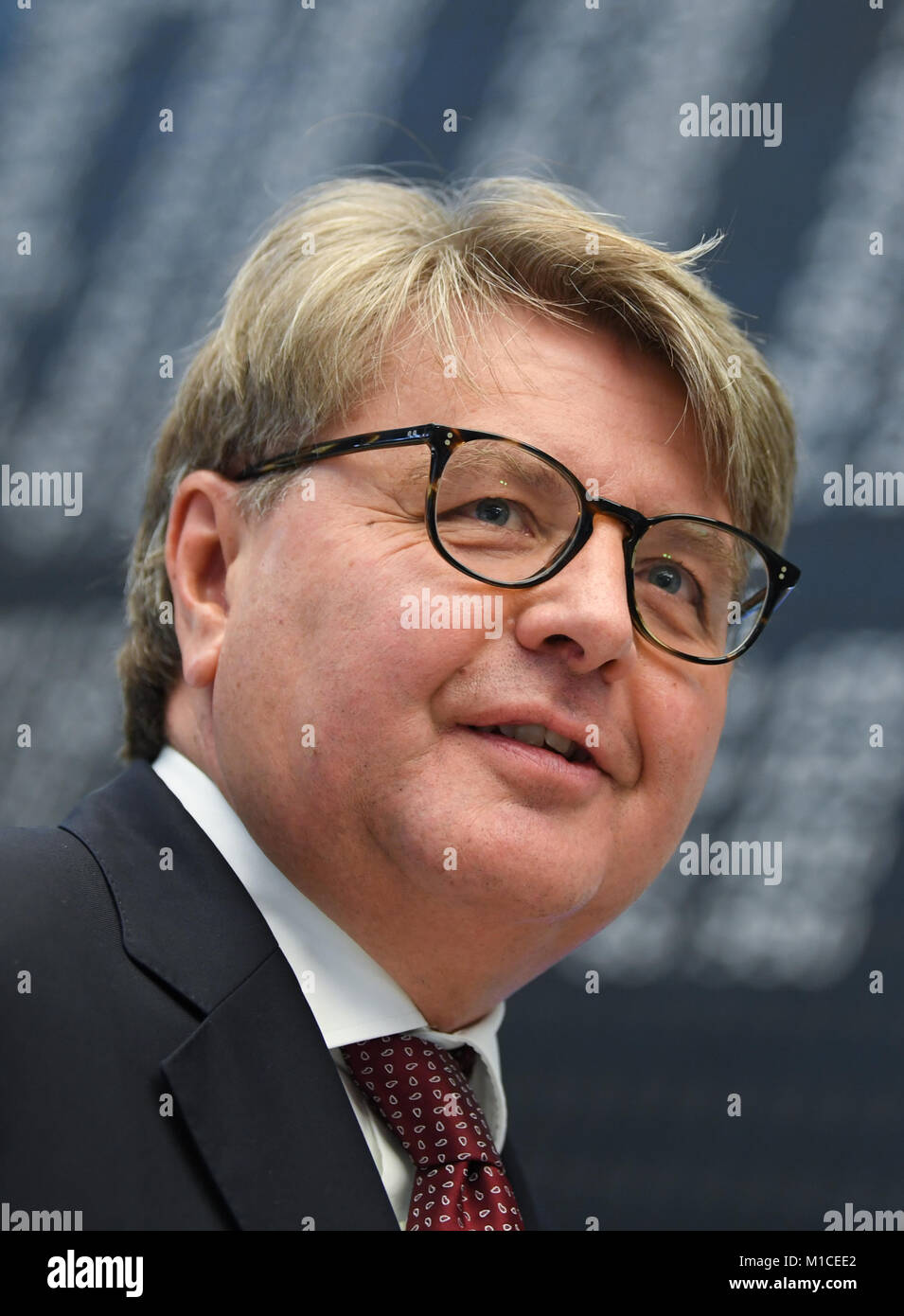 Theodor Weimer, chairman of the German Stock Exchange, observes the ...