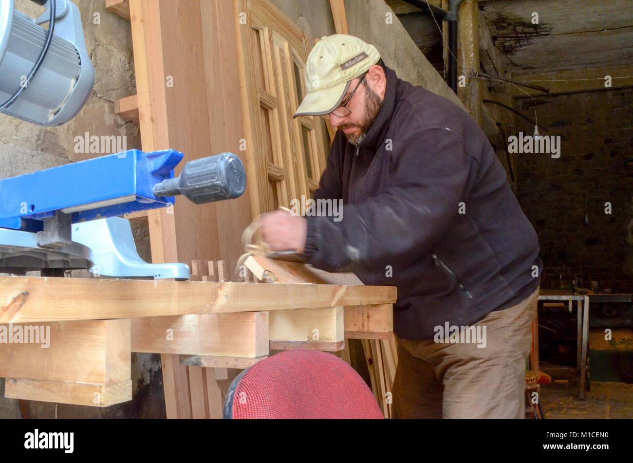 Homs, Syria. 29th Jan, 2018. Rabea Sahloul does woodwork in his ...