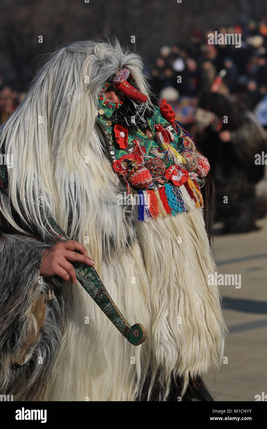 People with mask called Kukeri dance and perform to scare the evil ...
