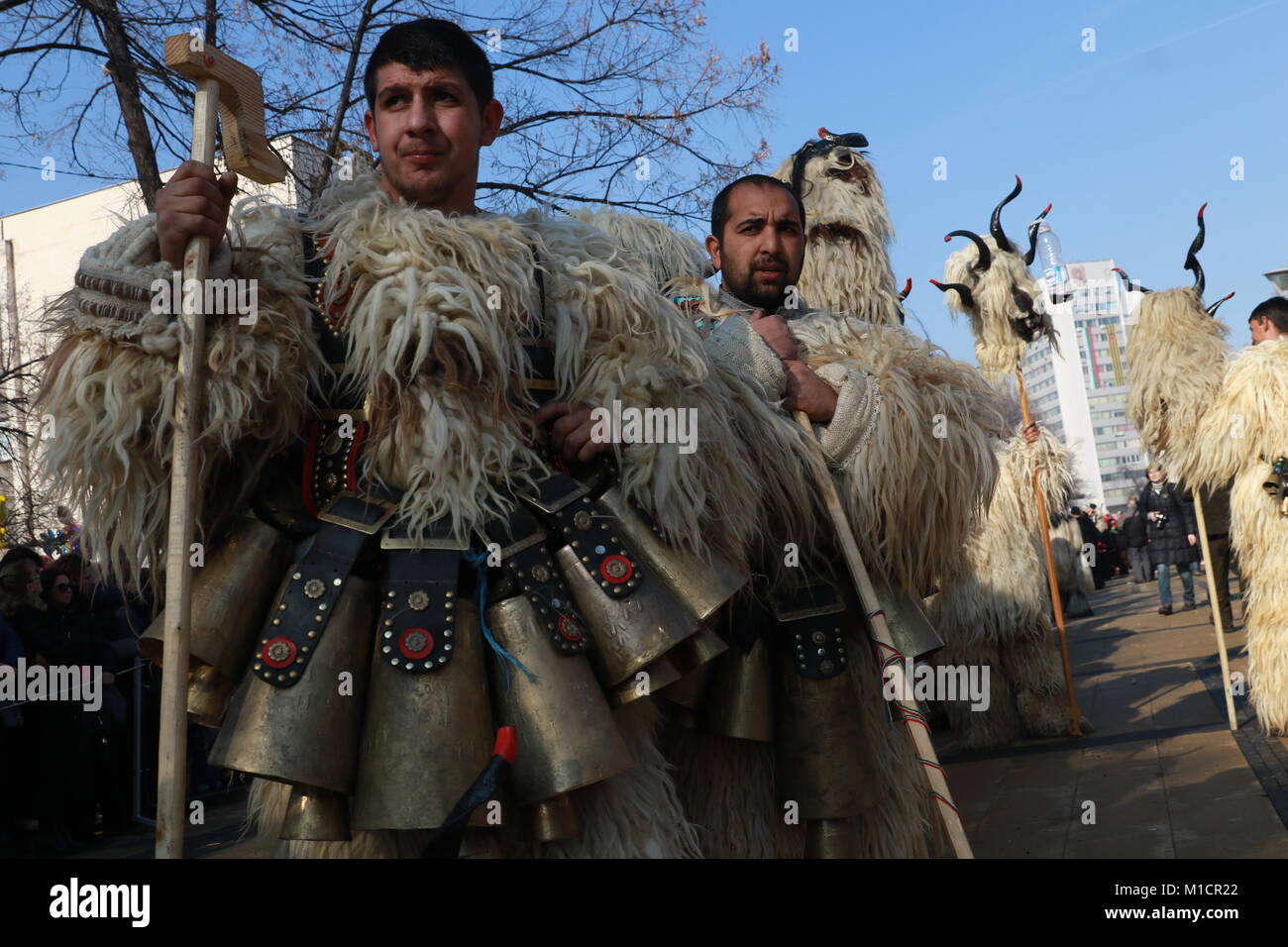 People with mask called Kukeri dance and perform to scare the evil ...