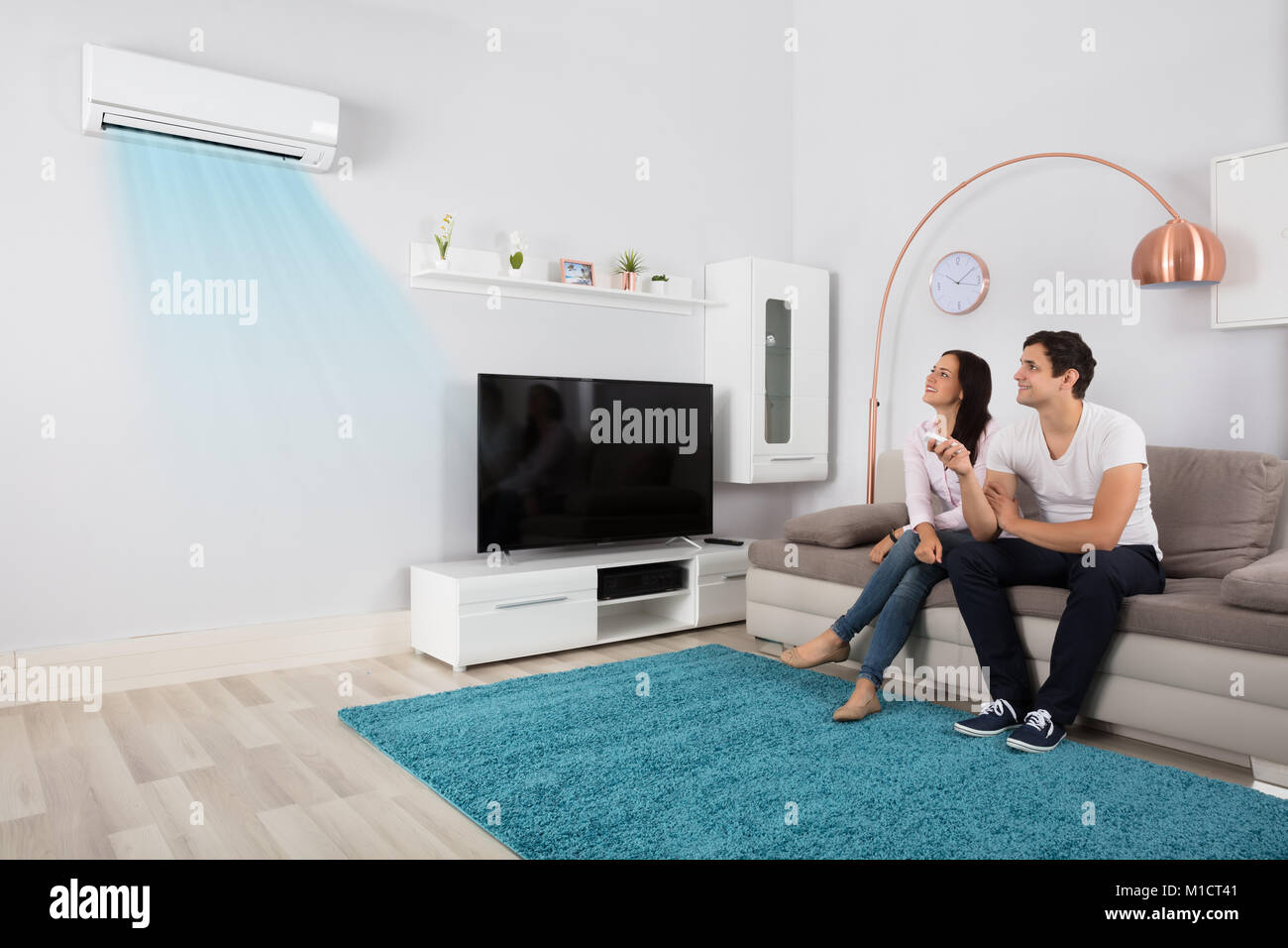 Man control operate air conditioner hi-res stock photography and images ...