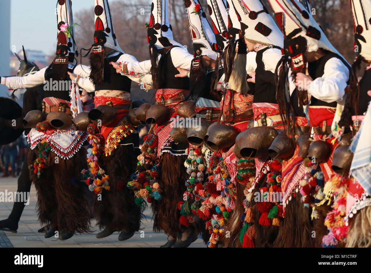 People with mask called Kukeri dance and perform to scare the evil ...