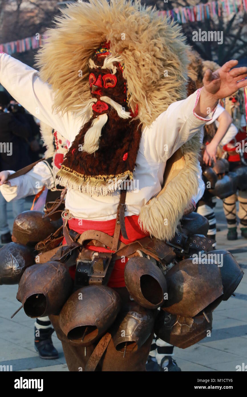 People with mask called Kukeri dance and perform to scare the evil ...