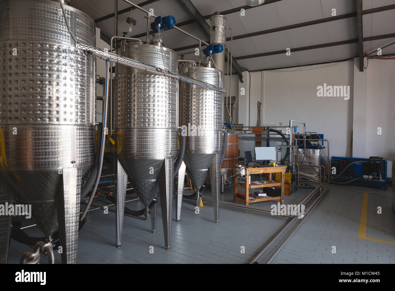 Distillery in gin factory Stock Photo - Alamy