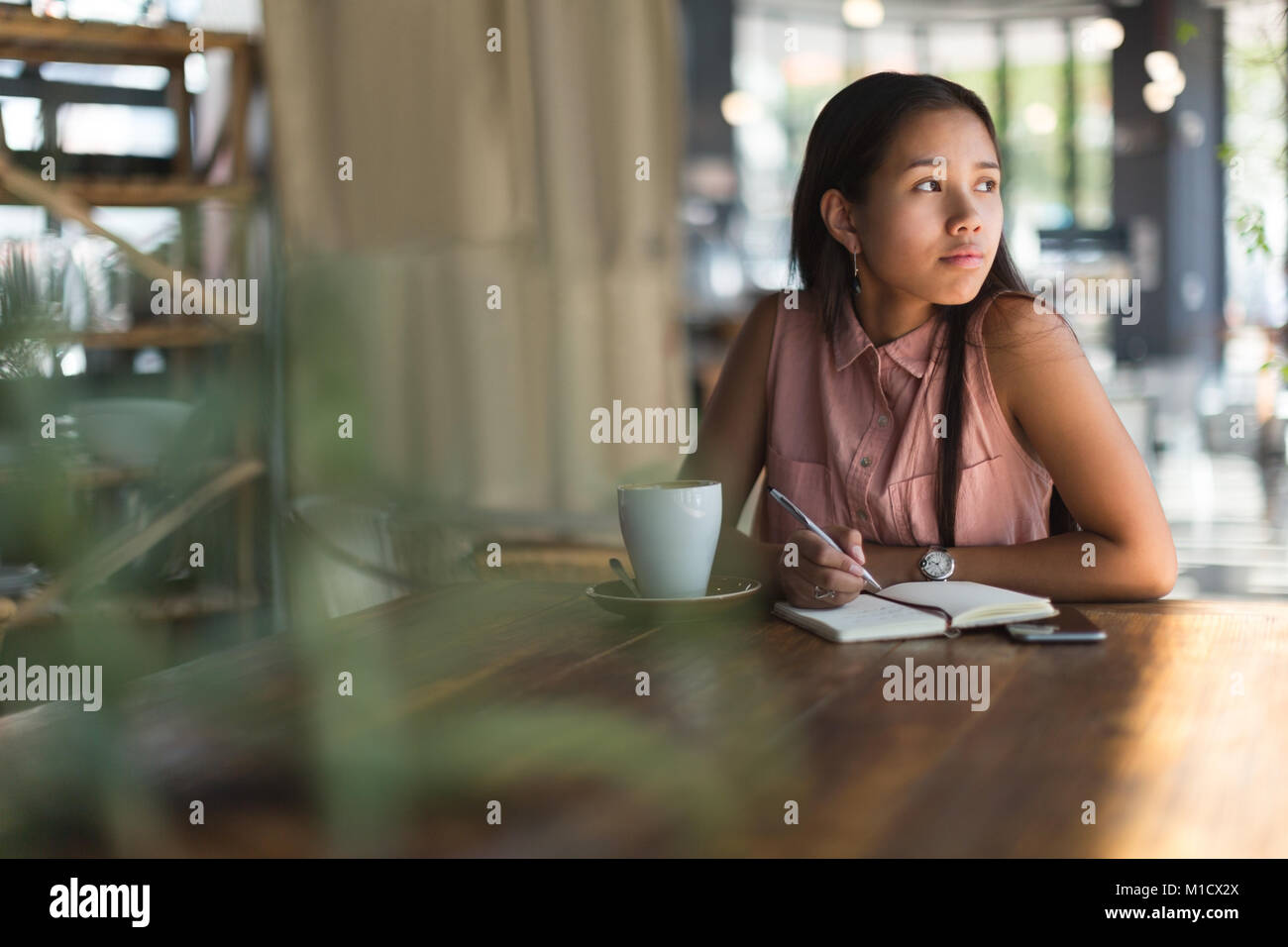Girl writing in diary hi-res stock photography and images - Alamy