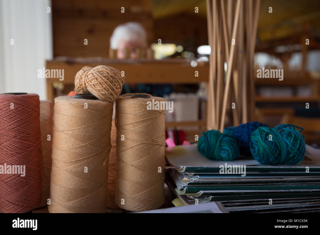Various silk thread in shop Stock Photo - Alamy