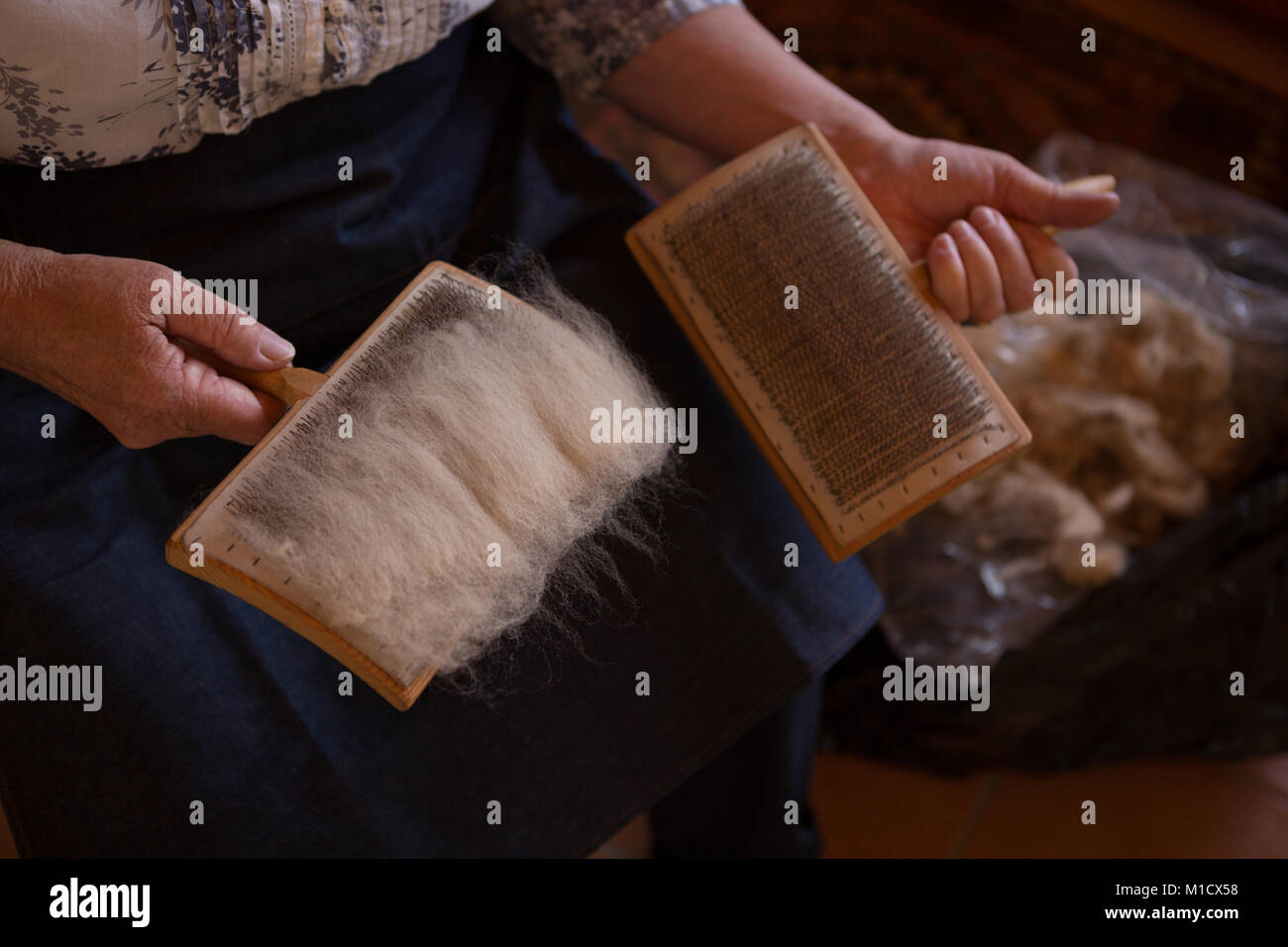 Woman using embroidery machine hi-res stock photography and images - Alamy