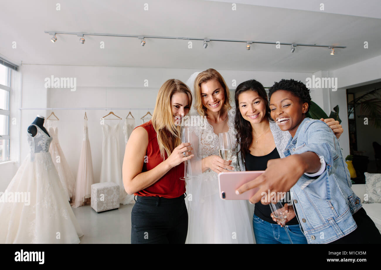 Woman wedding dress friends hi-res stock photography and images - Alamy