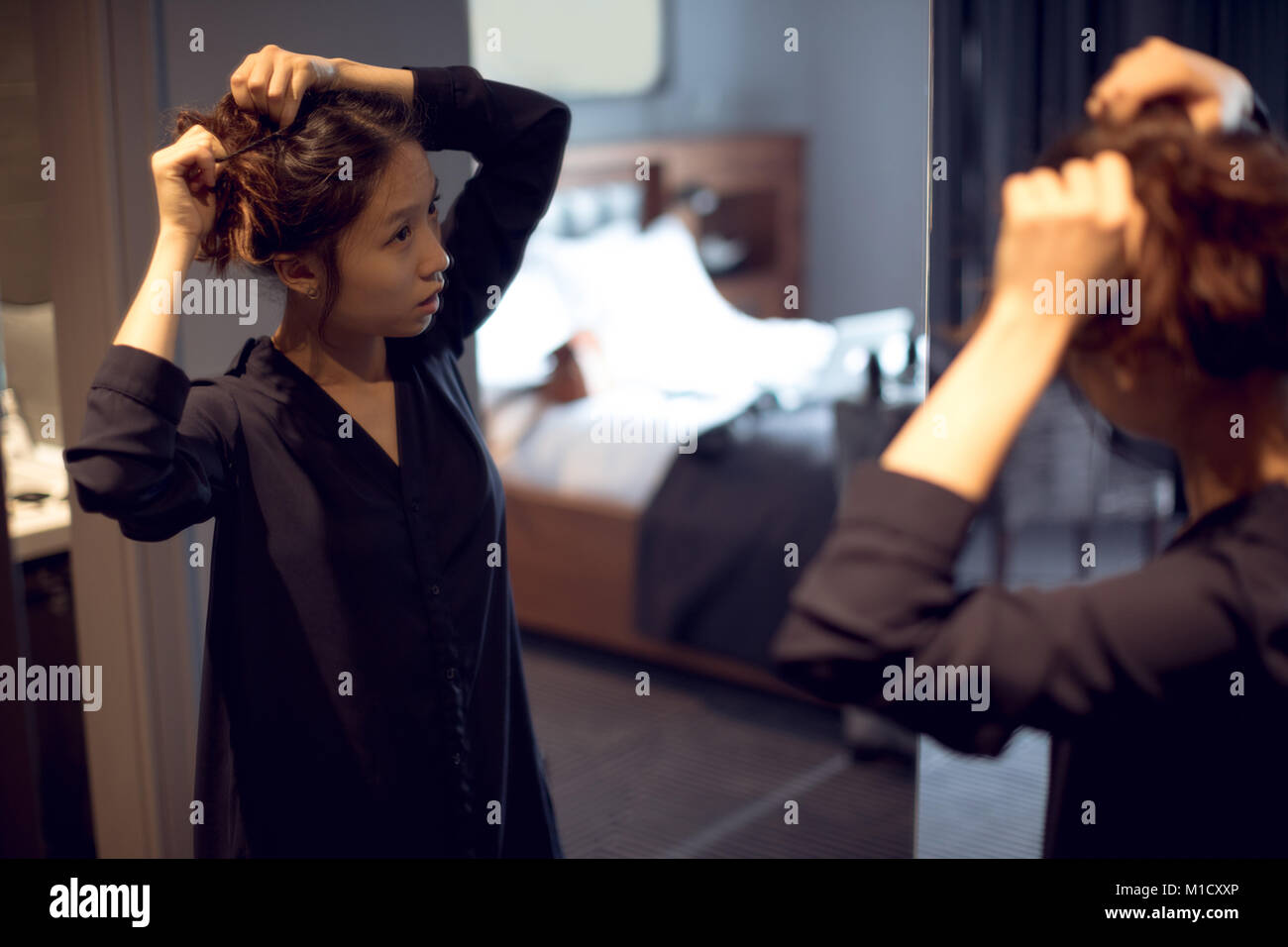 Getting ready in mirror hi-res stock photography and images - Alamy