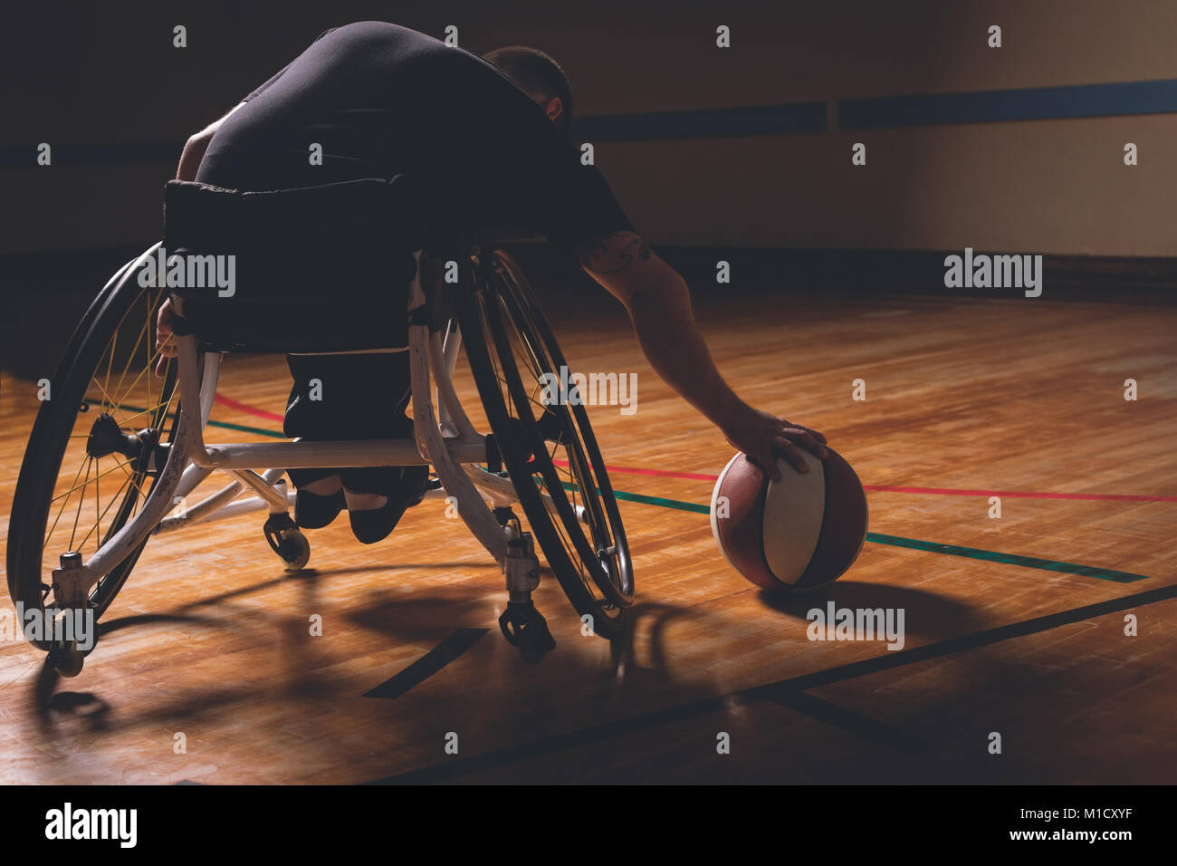 Disabled man in wheelchair throwing hi-res stock photography and images ...