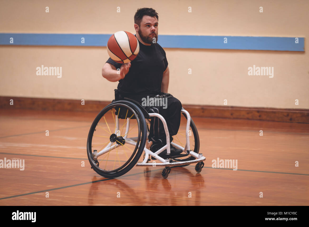 Disabled man practicing basketball in the court Stock Photo - Alamy