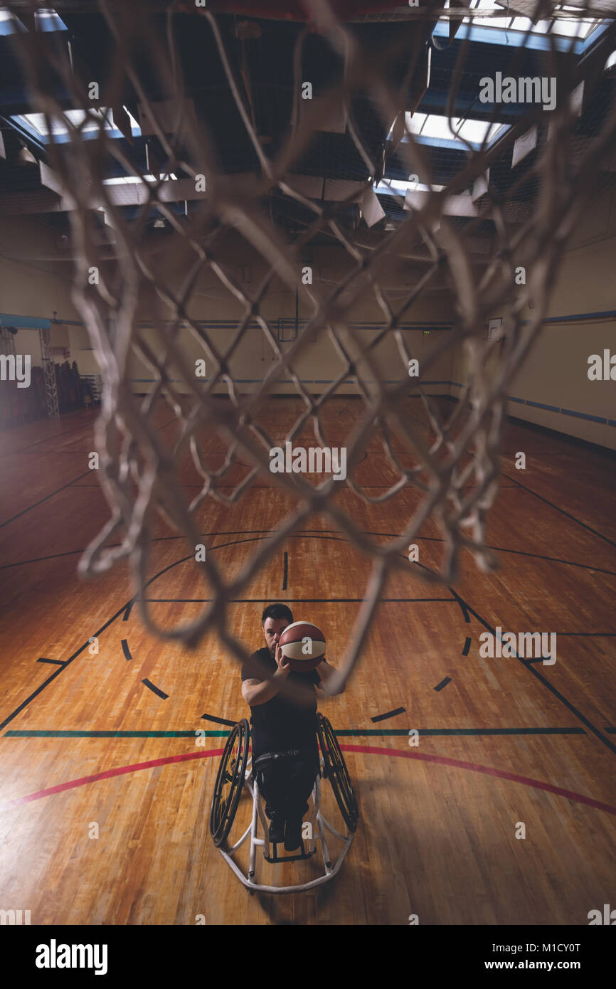 Disabled man practicing basketball in the court Stock Photo - Alamy