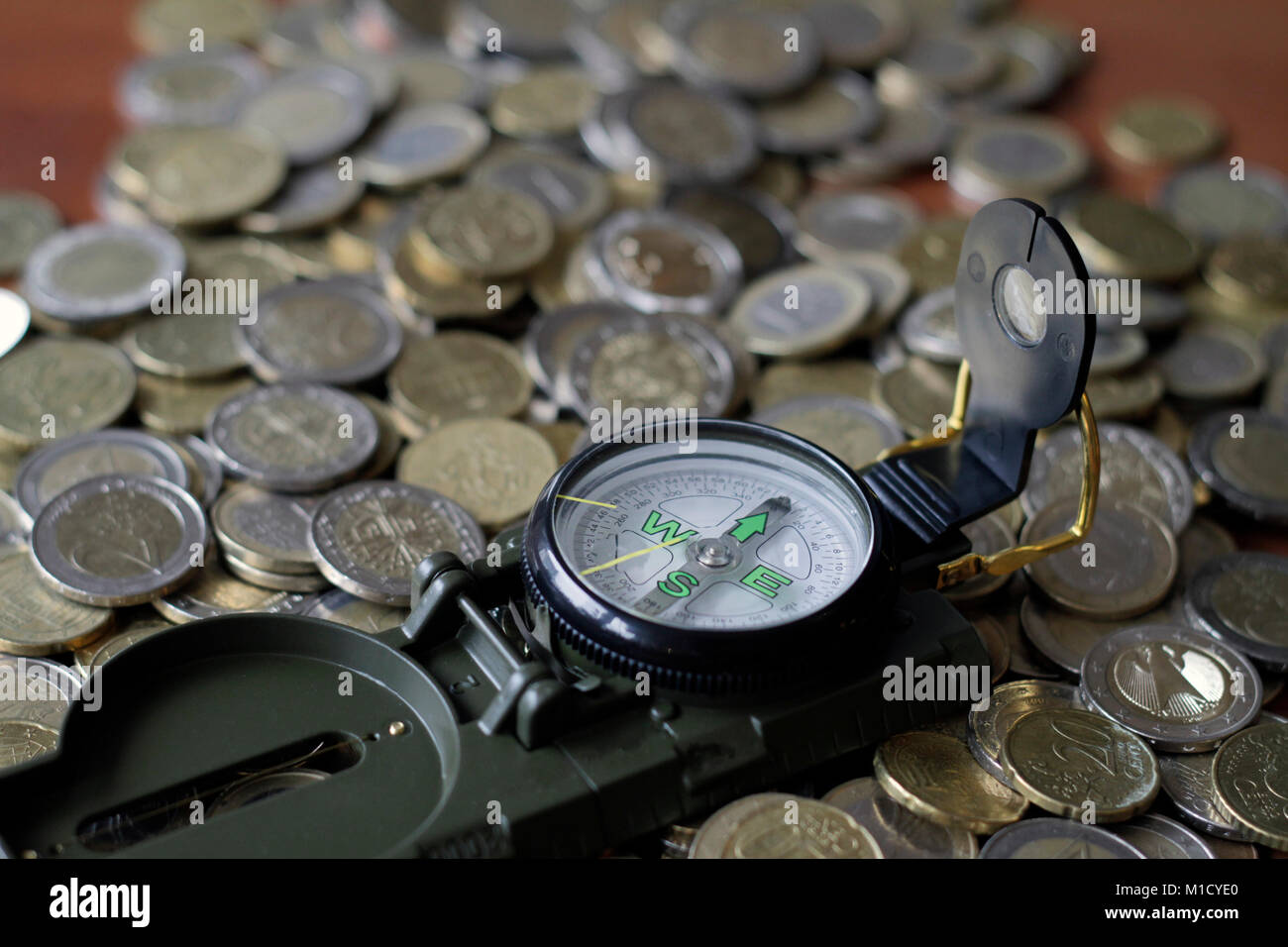 Compass Money High Resolution Stock Photography and Images - Alamy