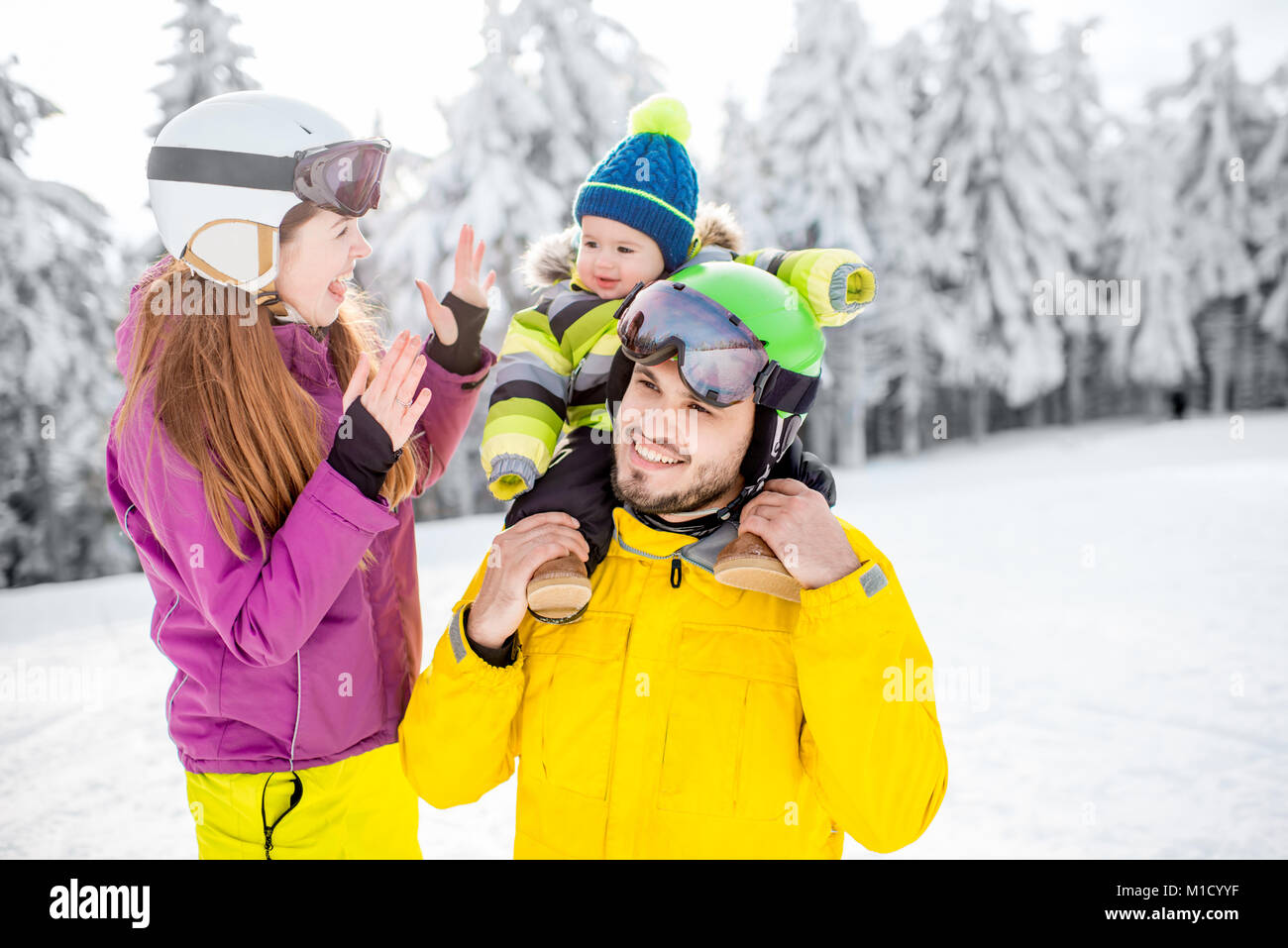 Happy family during the winter vacations Stock Photo - Alamy