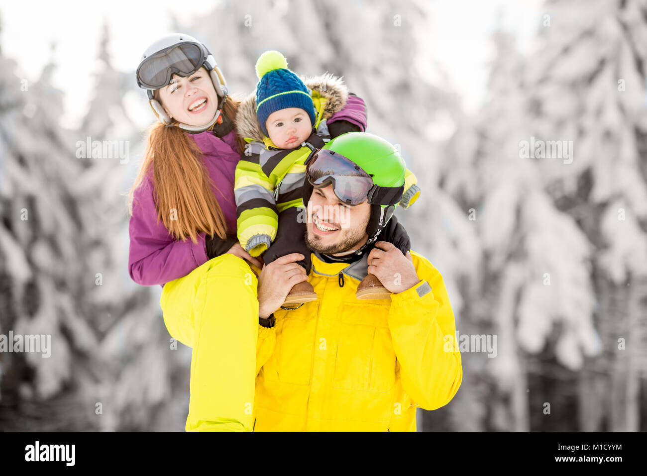 Happy family during the winter vacations Stock Photo - Alamy