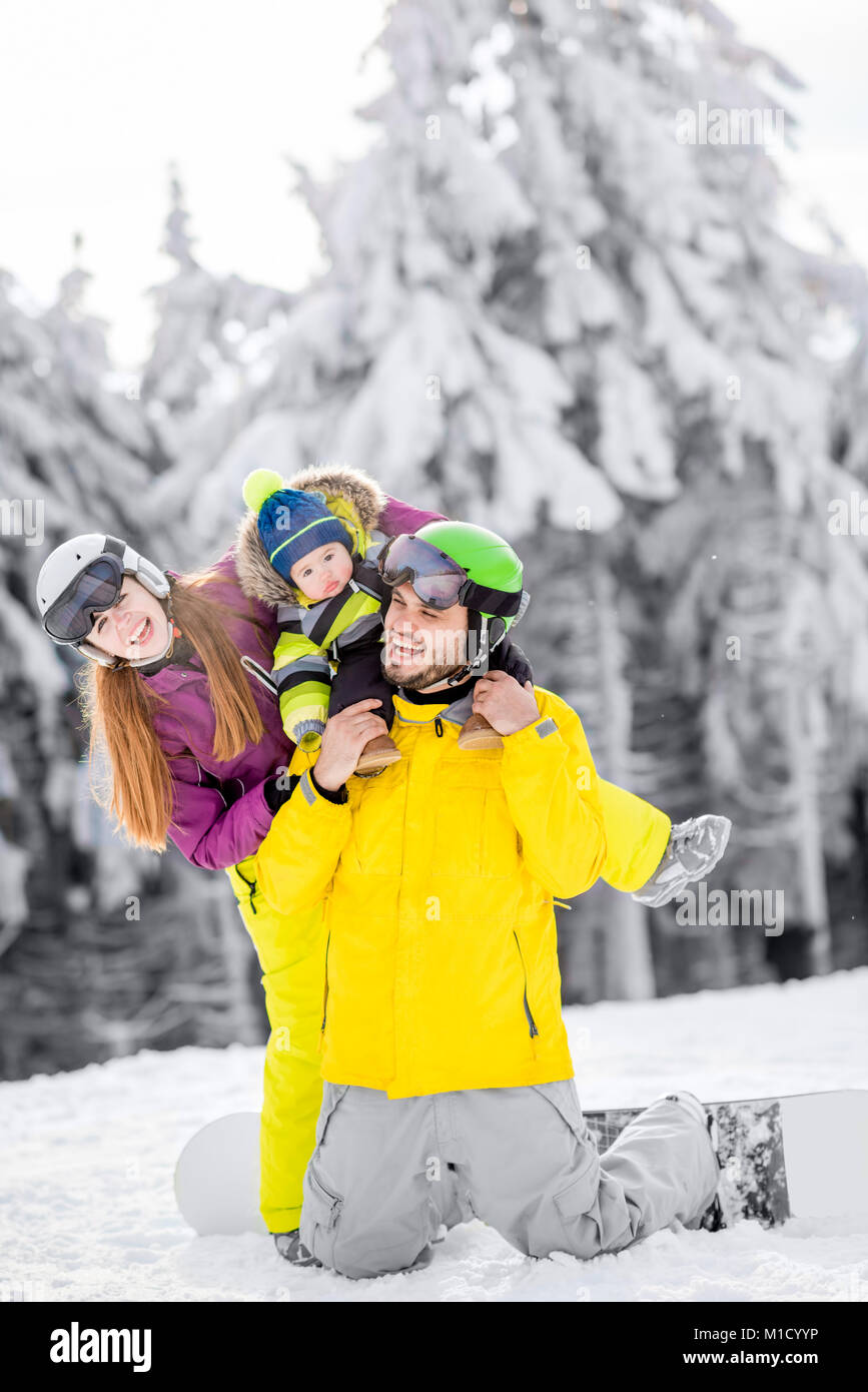 Happy family during the winter vacations Stock Photo - Alamy