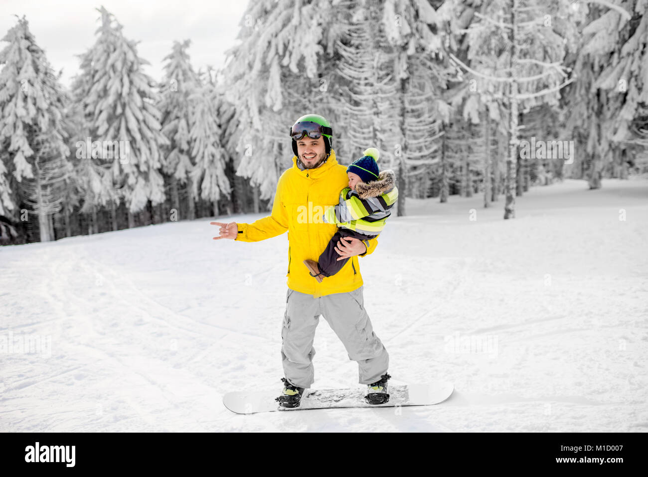 Man snowboarding at the mountains Stock Photo - Alamy