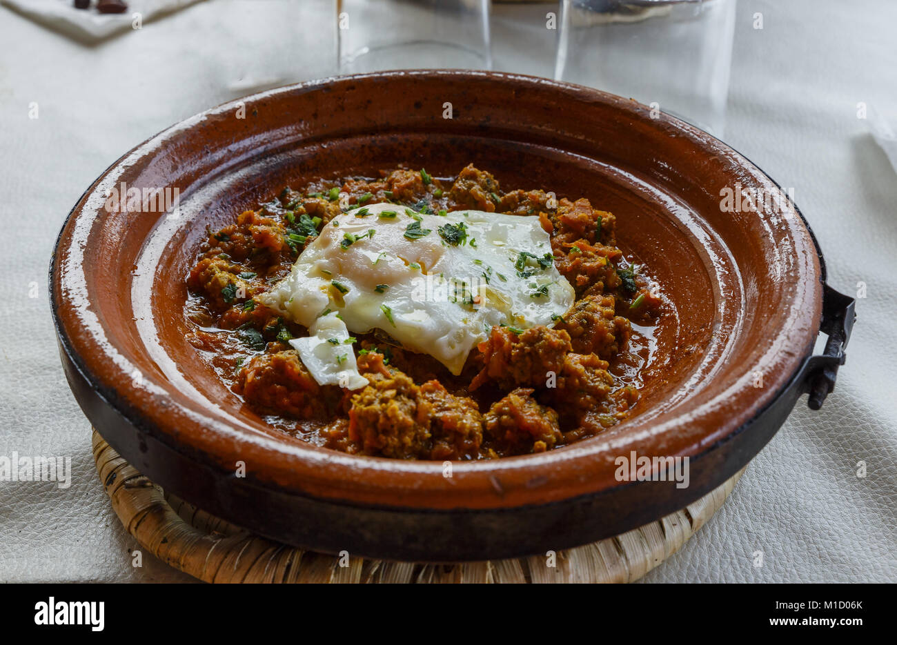 tajine with egg and meat, morocco Stock Photo - Alamy