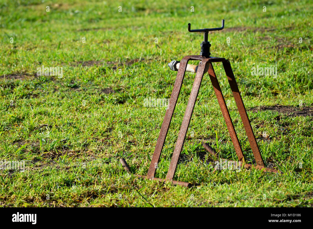 Old water sprinkler Stock Photo - Alamy