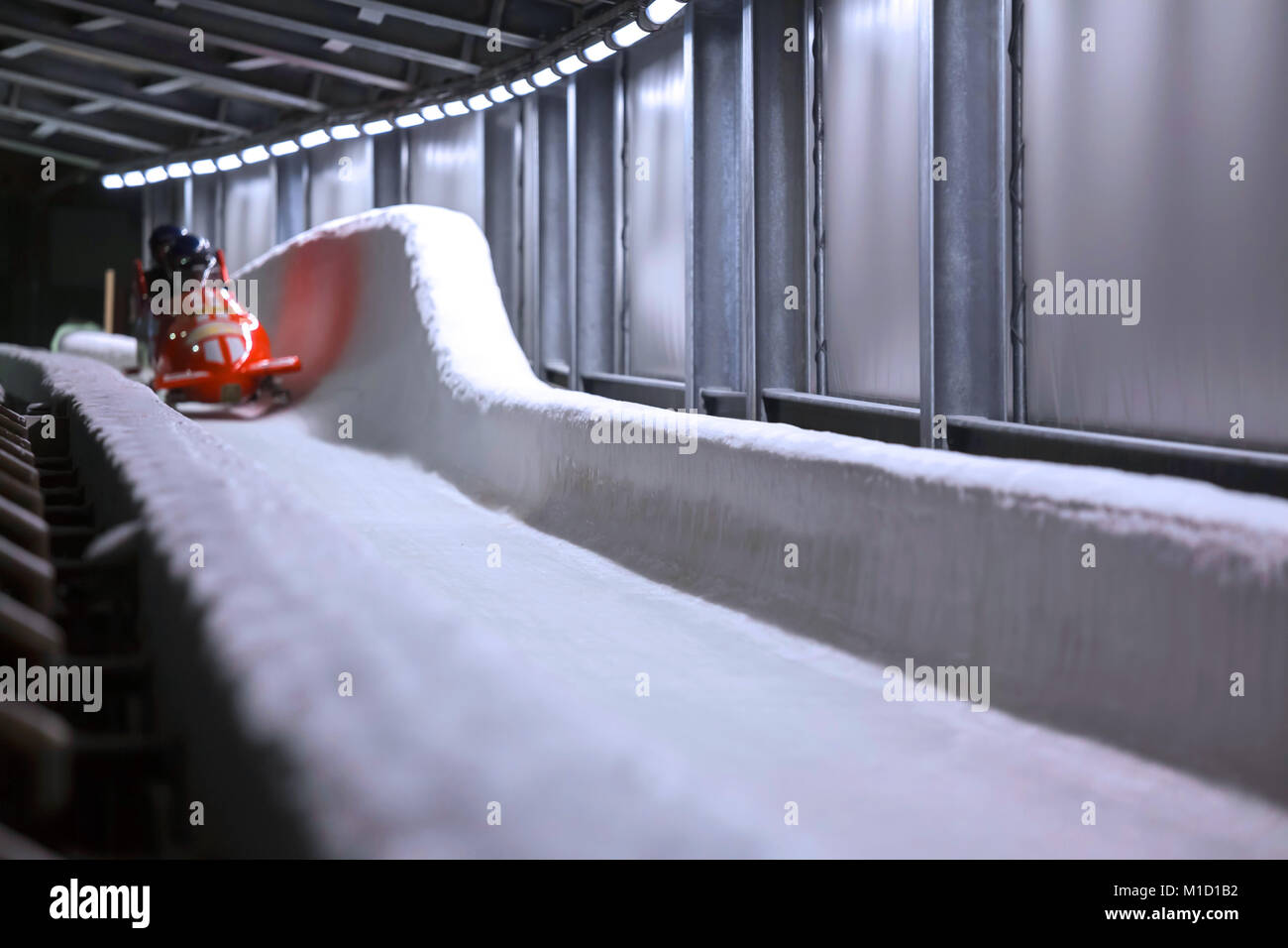 bob sled speeding in an ice channel Stock Photo - Alamy