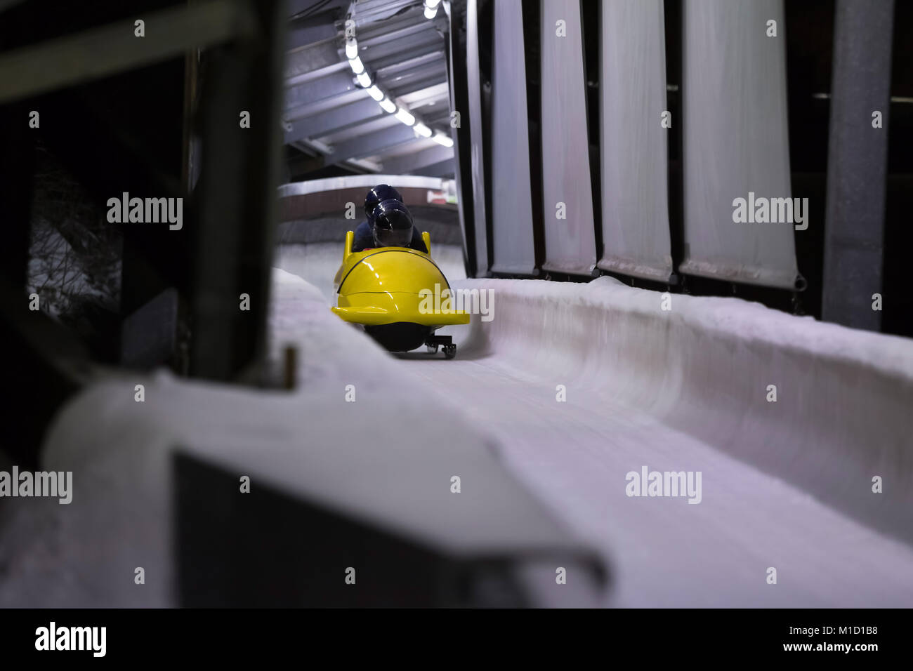 bob sled speeding in an ice channel Stock Photo - Alamy