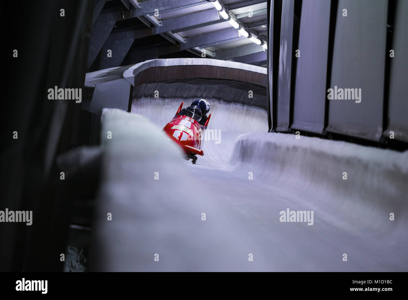 bob sled speeding in an ice channel Stock Photo - Alamy