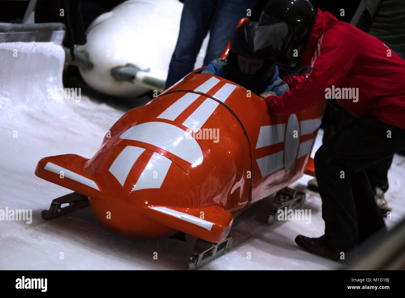 a red bob sled on the start Stock Photo - Alamy