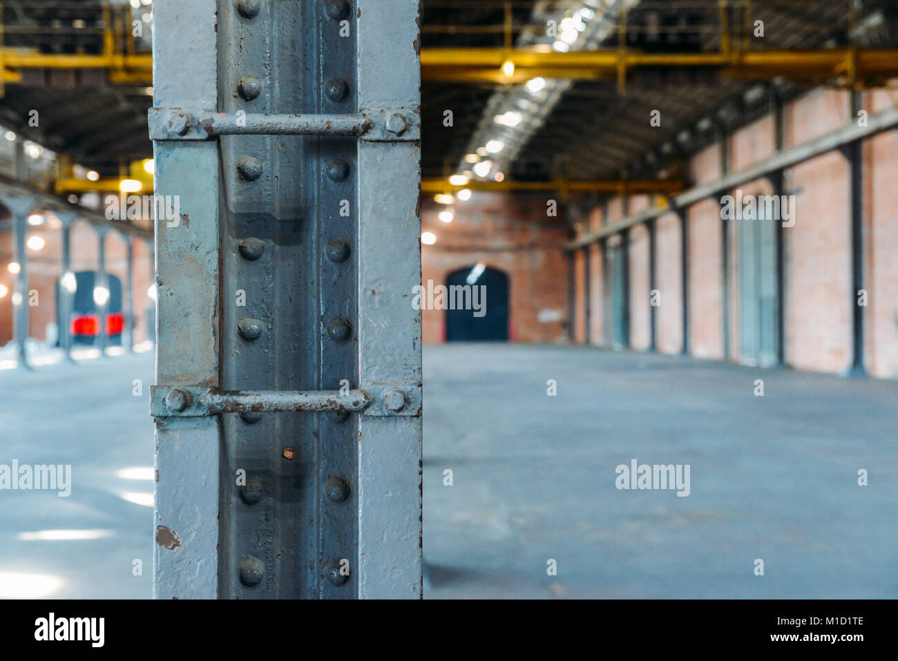 Old and dusty warehouse, with light coming through openings Stock Photo ...
