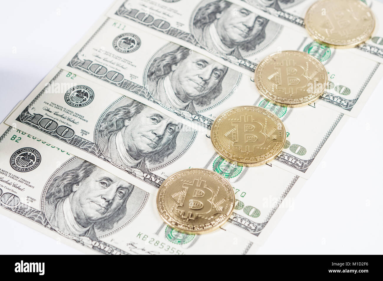 New virtual money Golden bitcoin coin on us dollars background ...