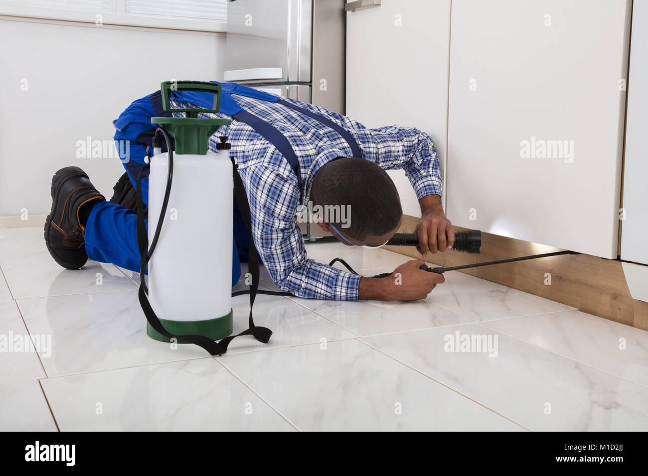 Kneeling on floor hi-res stock photography and images - Alamy