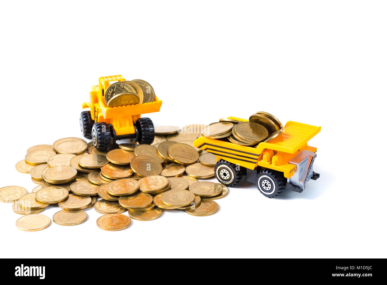 Mini bulldozer truck loading stack coin with pile of gold coin ...
