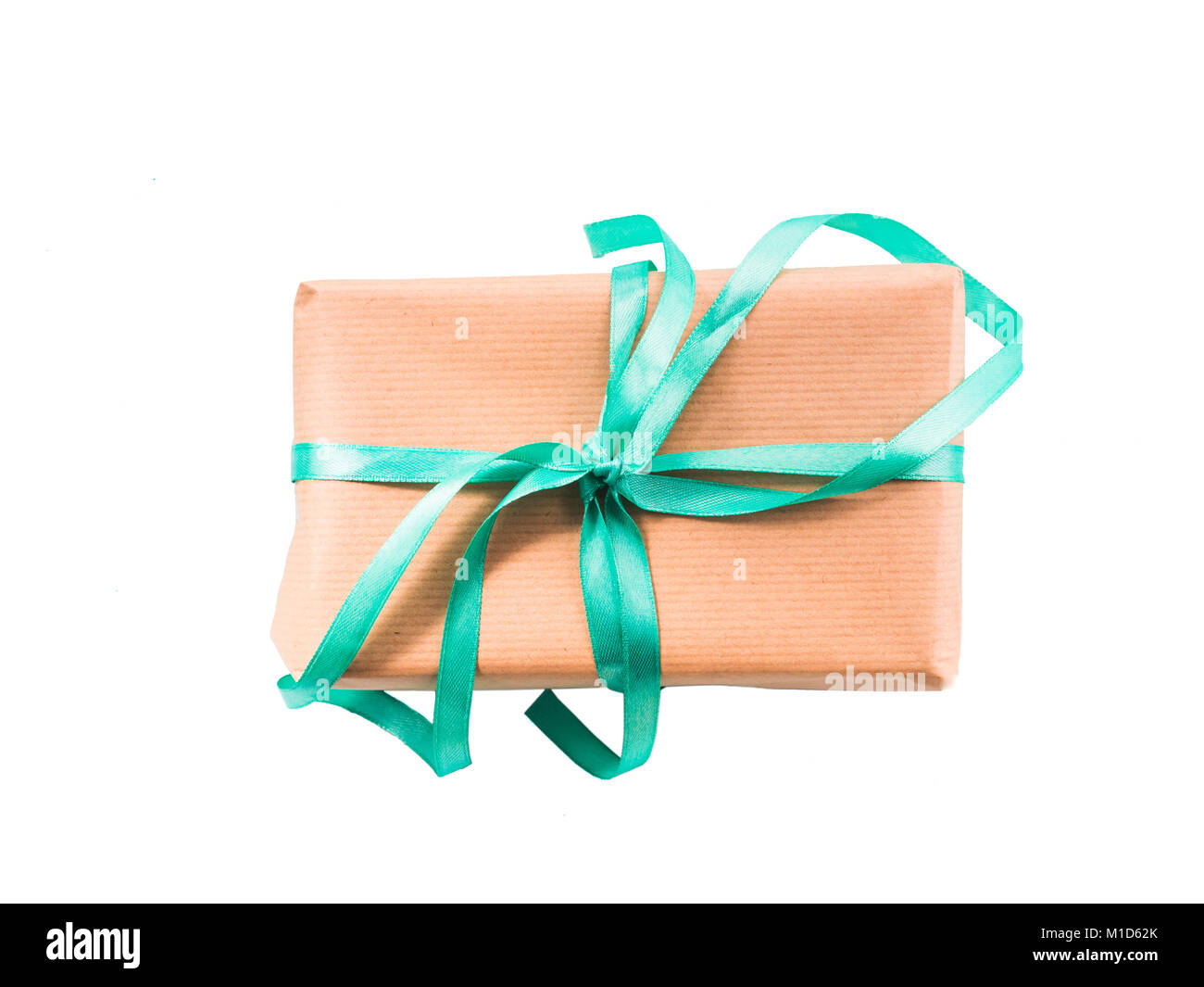 Gift box with green ribbon on pastel spring background. Copy space top ...