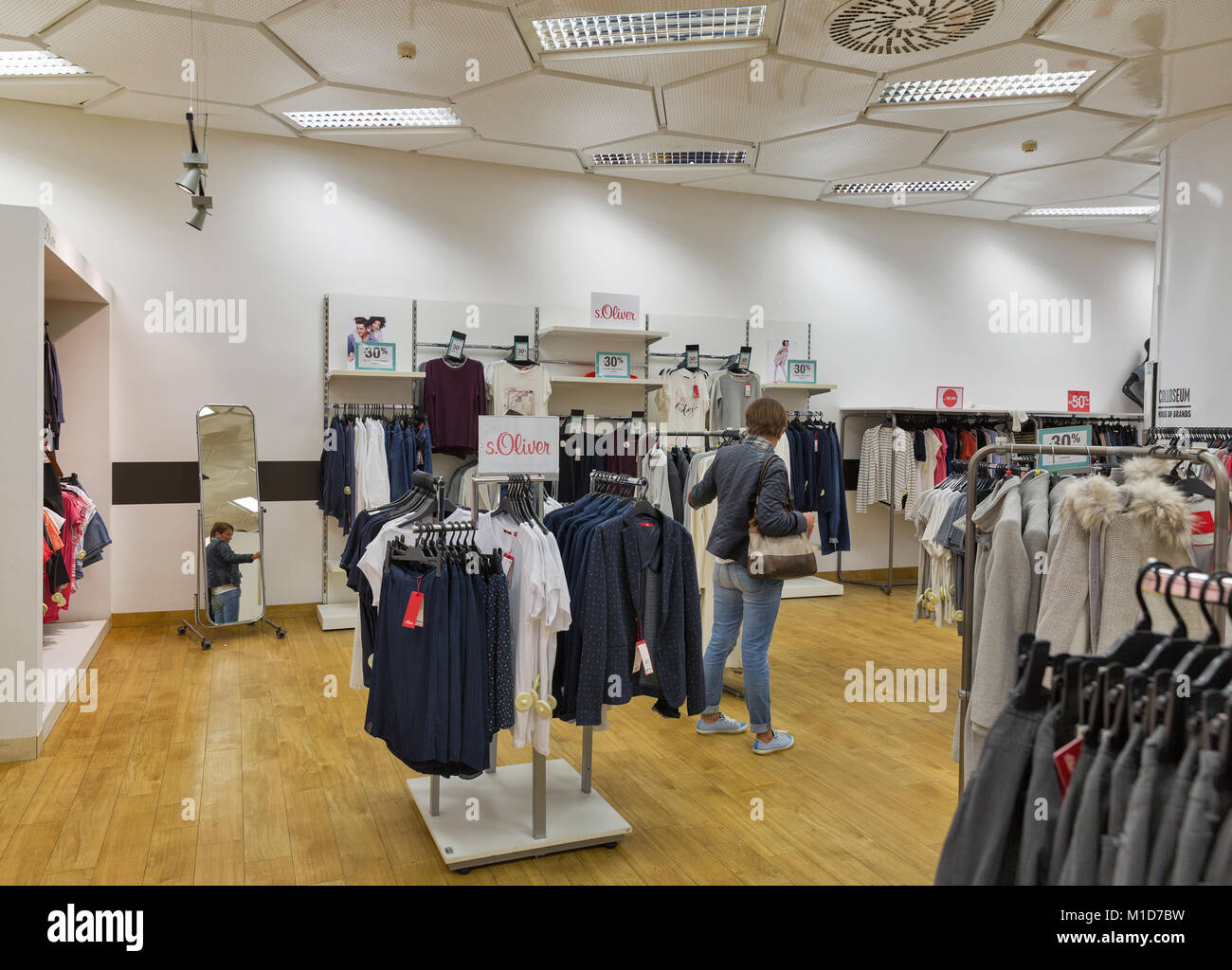 Inside middle aged women clothing shop hi-res stock photography and ...