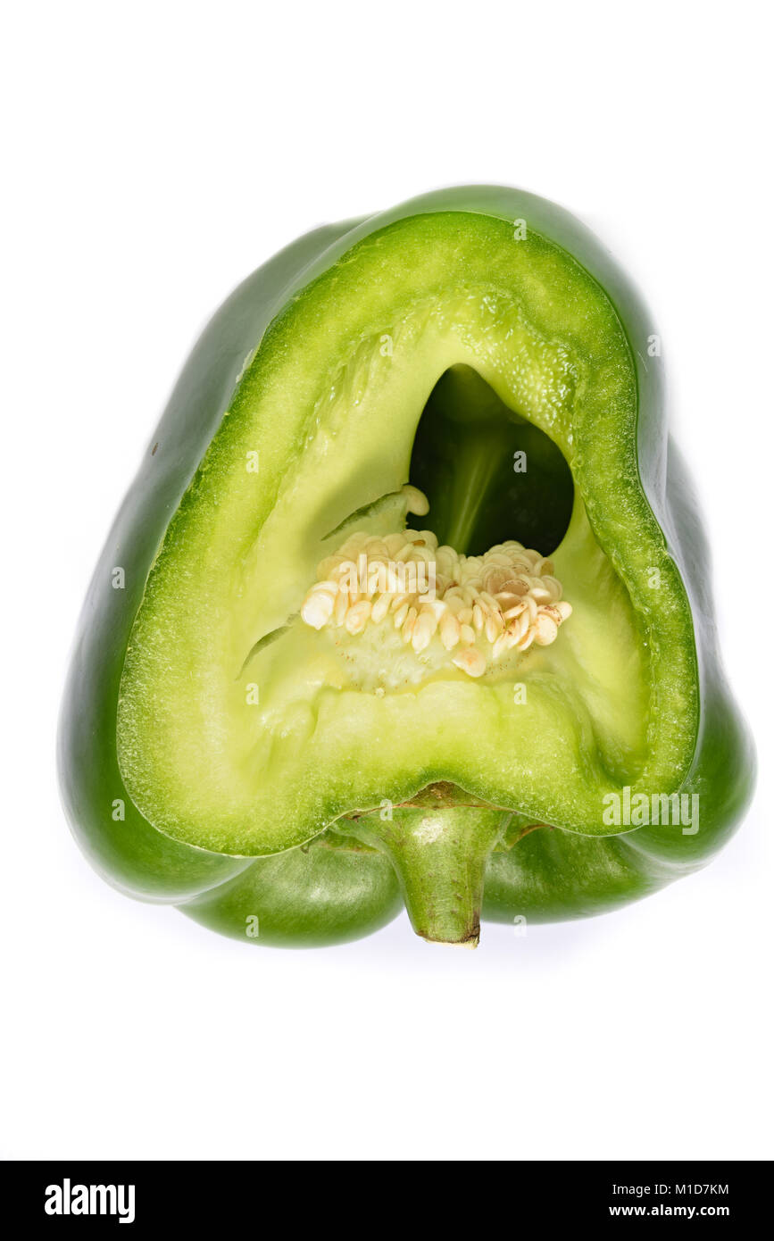 A green pepper sliced in half Stock Photo - Alamy