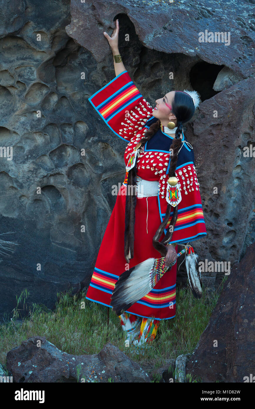 Willow Abrahamson poses along a basalt cliff at Twin Falls State Park ...