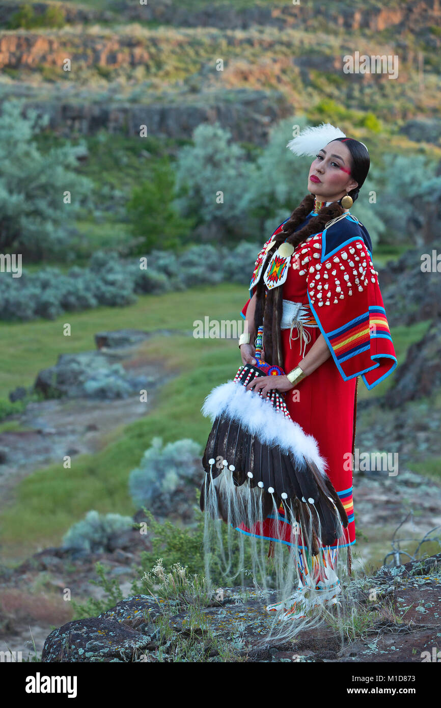 Willow Abrahamson poses along a basalt cliff at Twin Falls State Park ...
